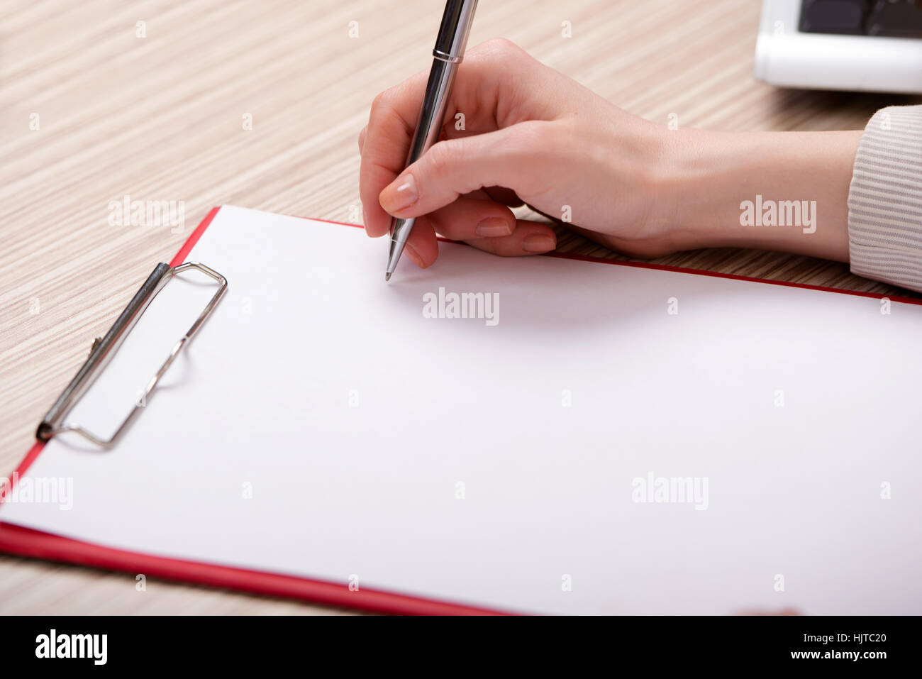 Hand writing memo in business concept Stock Photo - Alamy