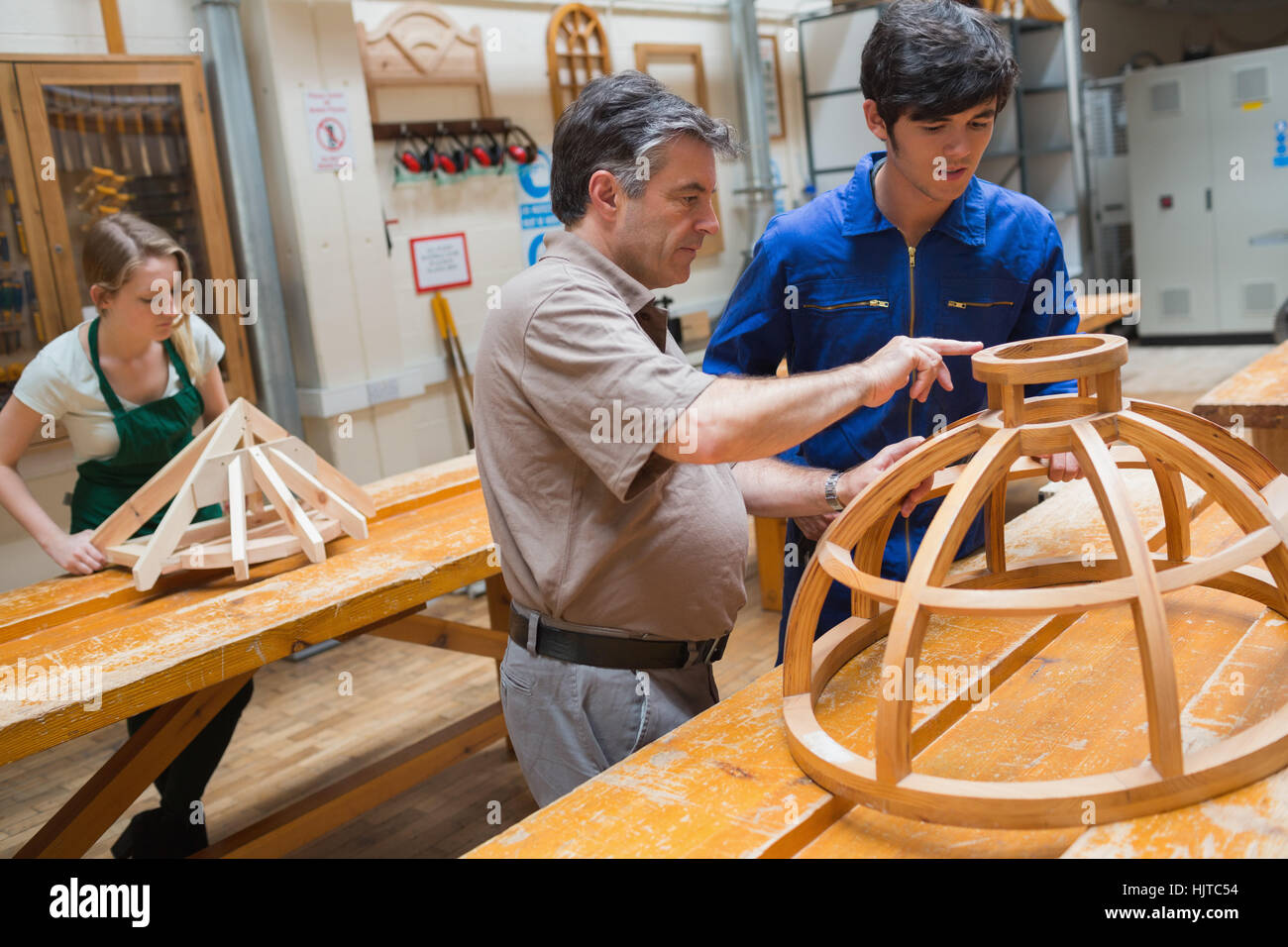 Male apprentice working carpenter in hi-res stock photography and ...