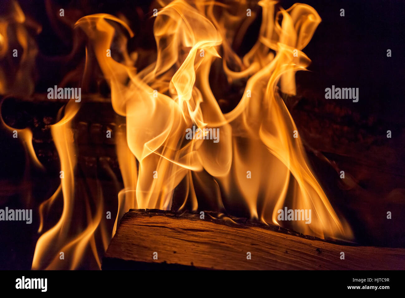 Fire in the fireplace, note shallow depth of field Stock Photo - Alamy