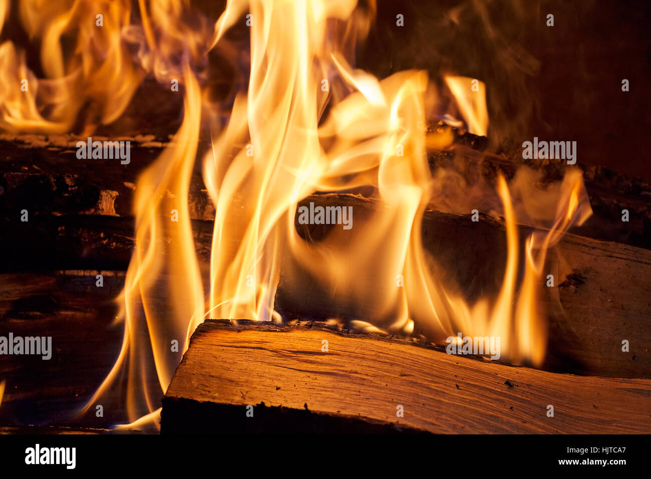 Fire in the fireplace, note shallow depth of field Stock Photo - Alamy