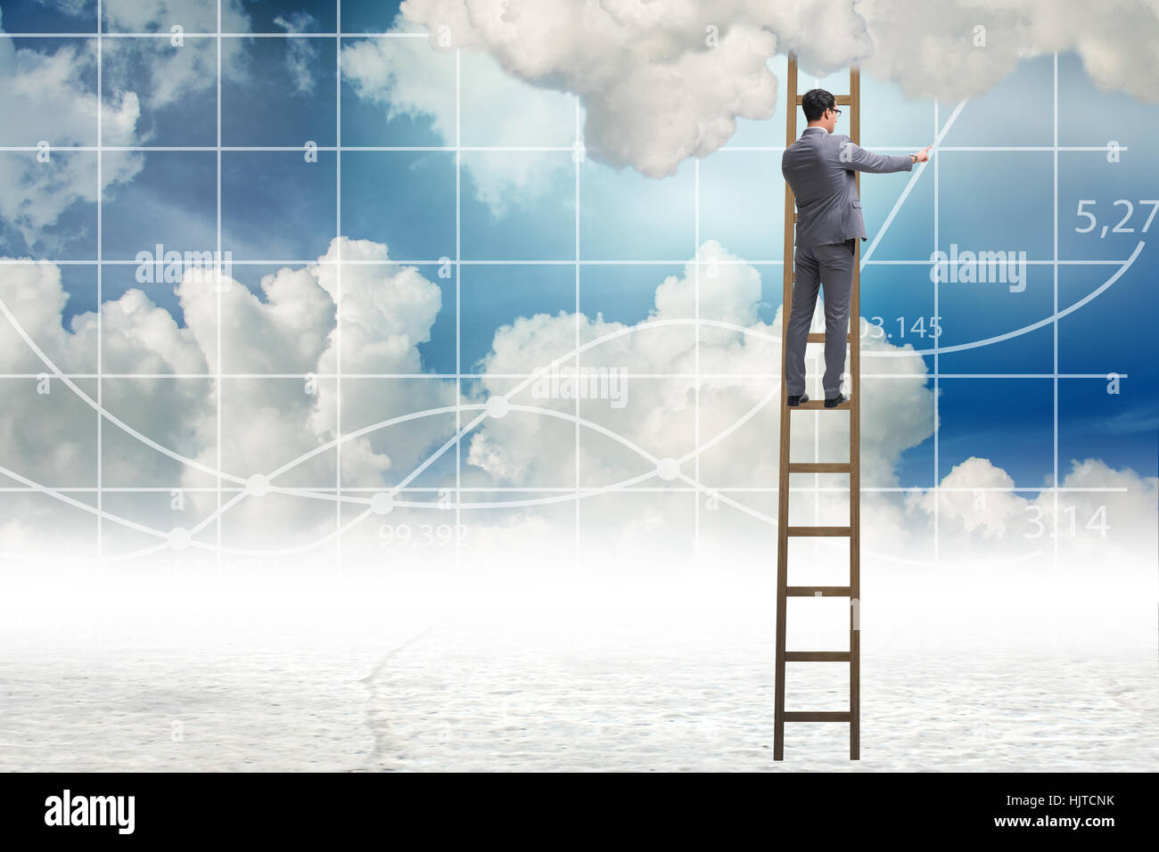 Businessman drawing charts in the sky Stock Photo - Alamy