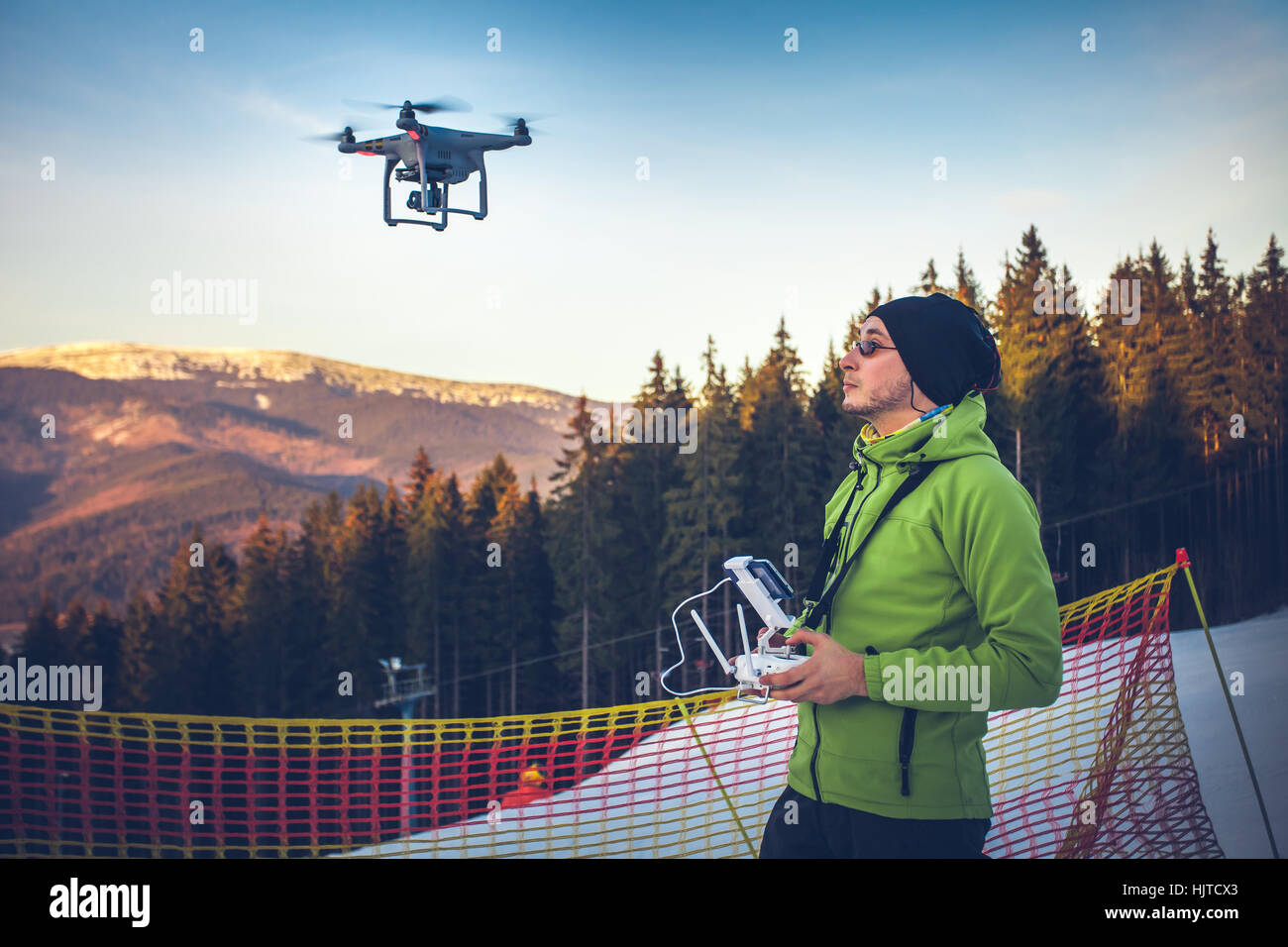 Man operating a drone Stock Photo - Alamy