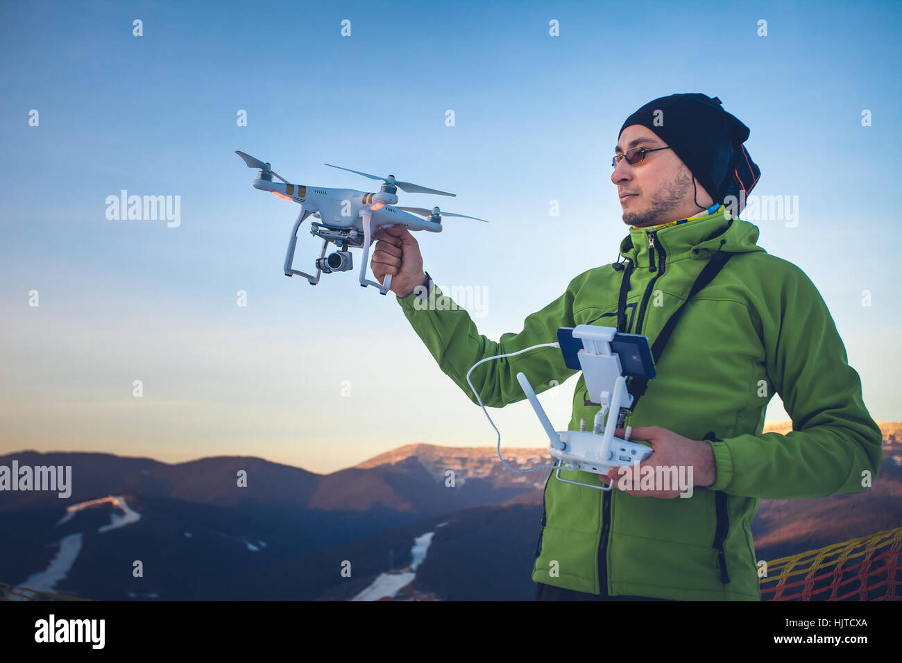 Man operating a drone Stock Photo - Alamy