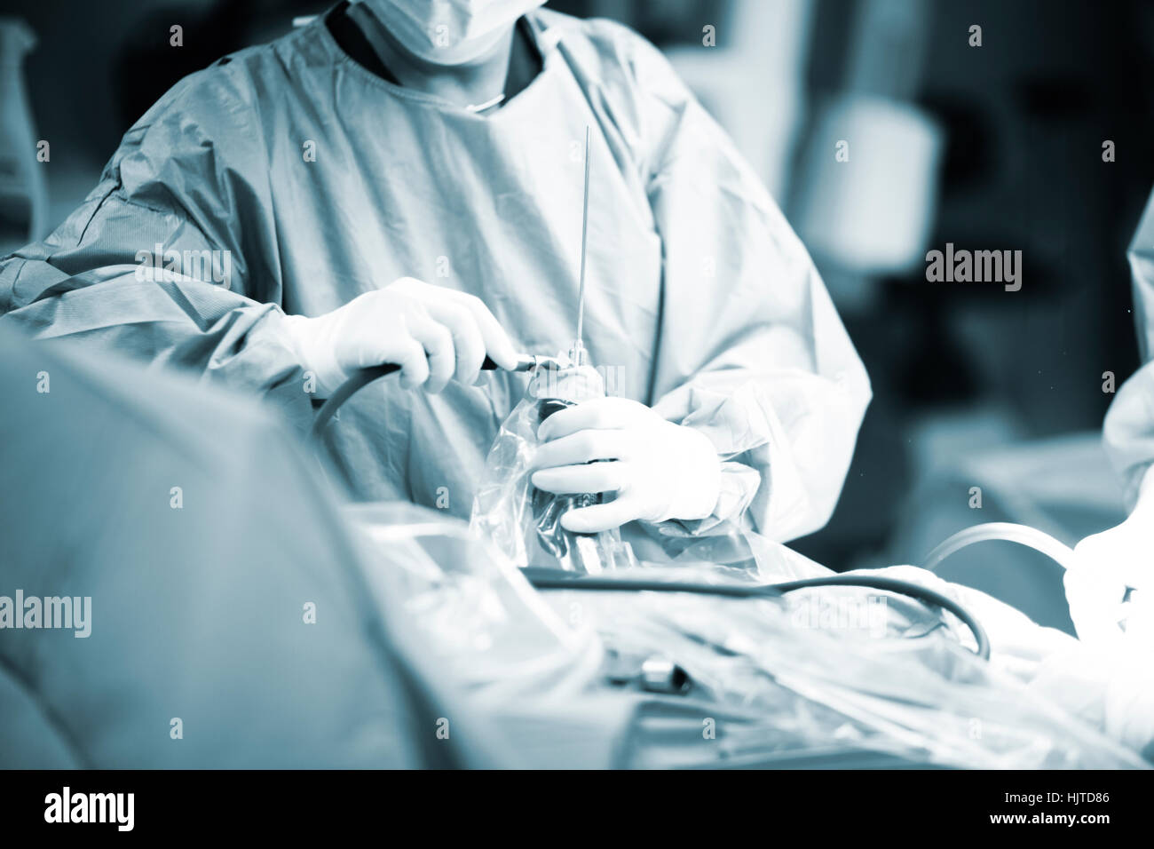 Surgeon in hospital surgery in sterile uniform "scrubs" in operating ...