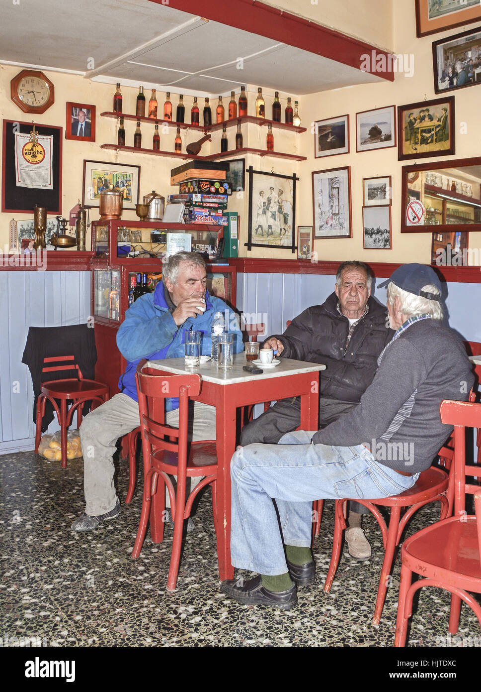 Traditional greek coffee-house in Aegina town, in Aegina island located ...