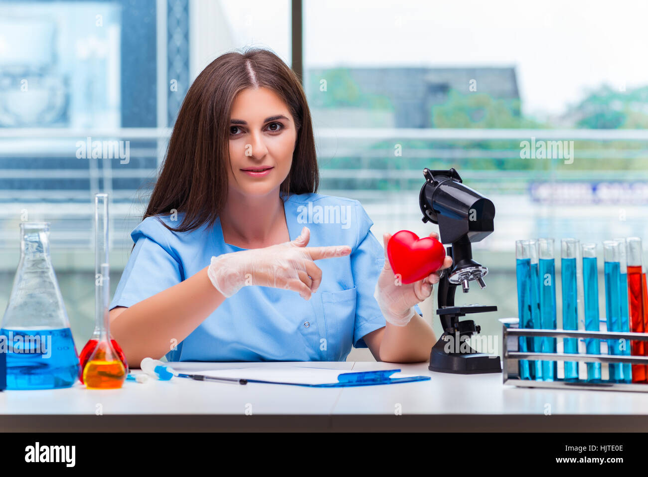 Young woman working in the laboratory Stock Photo - Alamy