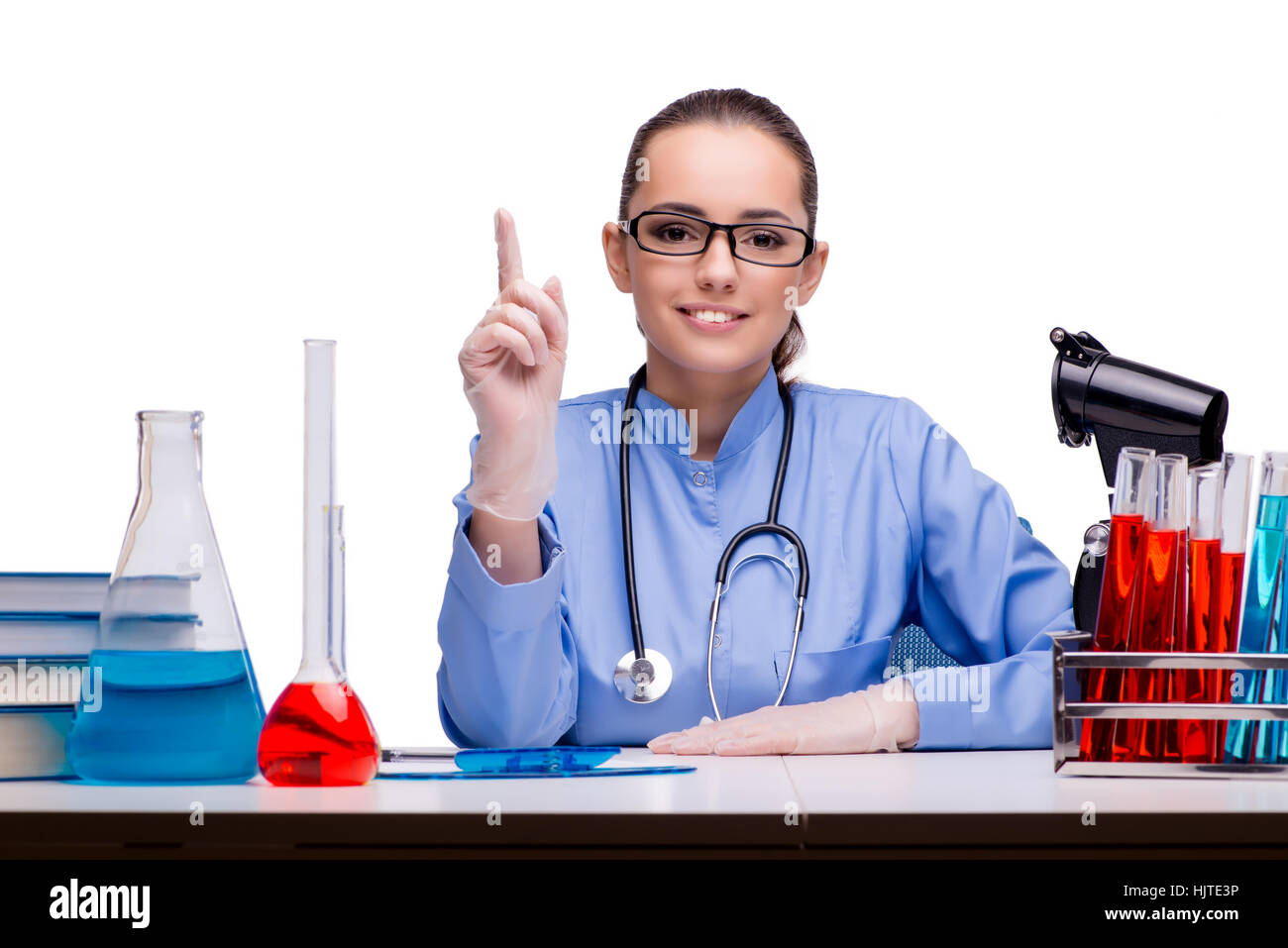 Lab chemist working with microscope and tubes Stock Photo - Alamy