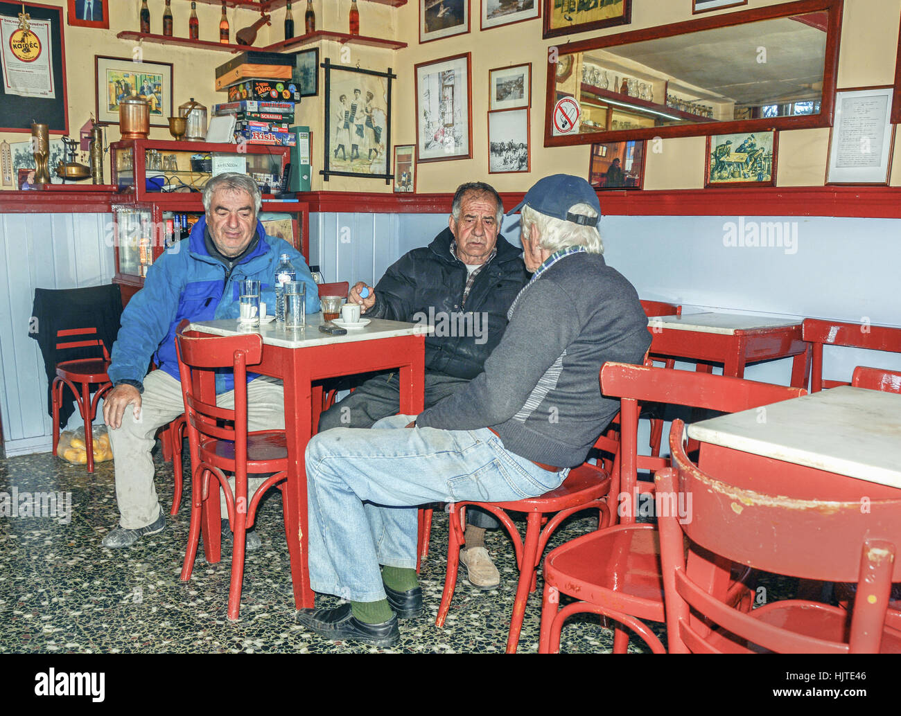 Traditional greek coffee-house in Aegina town, in Aegina island located ...