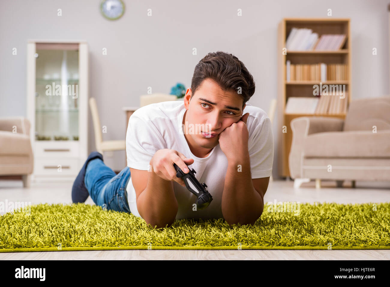 Man addicted to computer games Stock Photo - Alamy