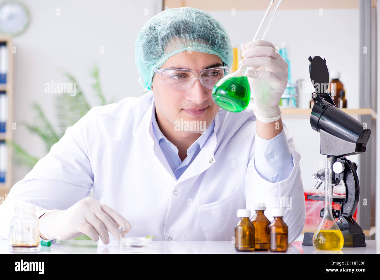 Biotechnology concept with scientist in lab Stock Photo - Alamy