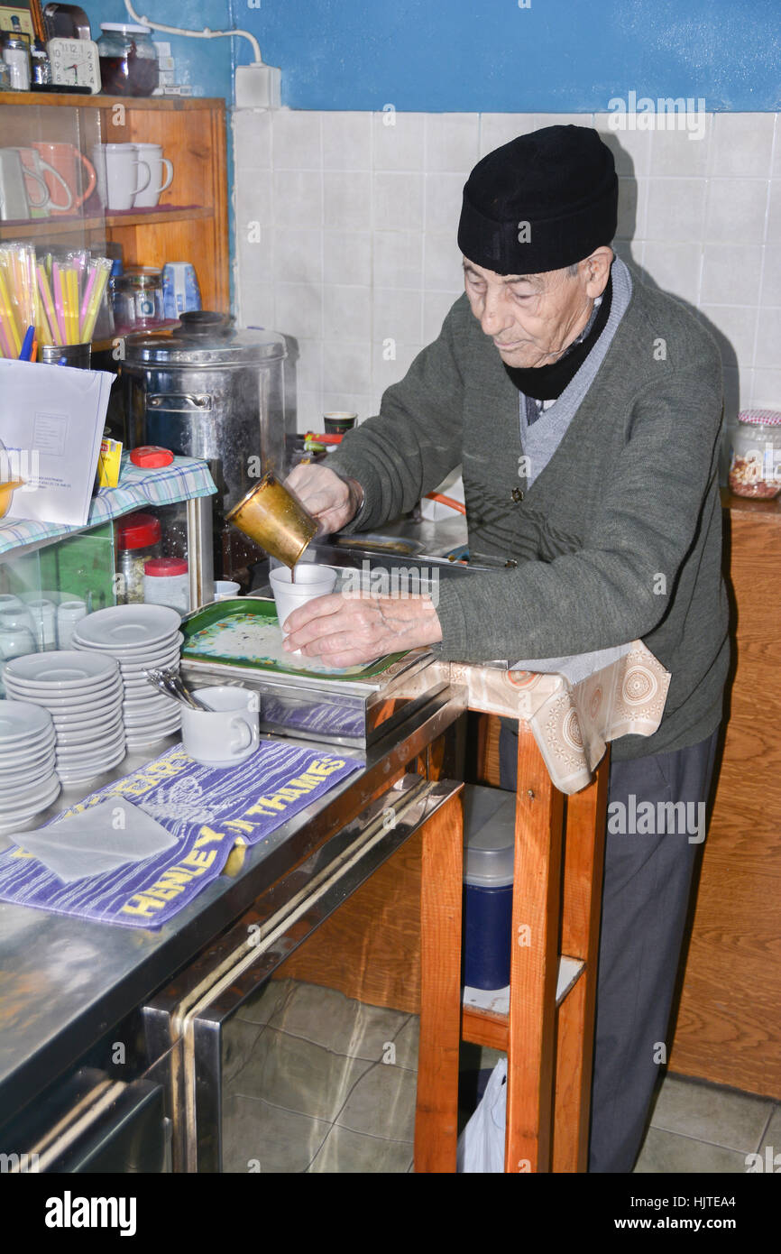 Traditional greek coffee-house in Aegina town, in Aegina island located ...