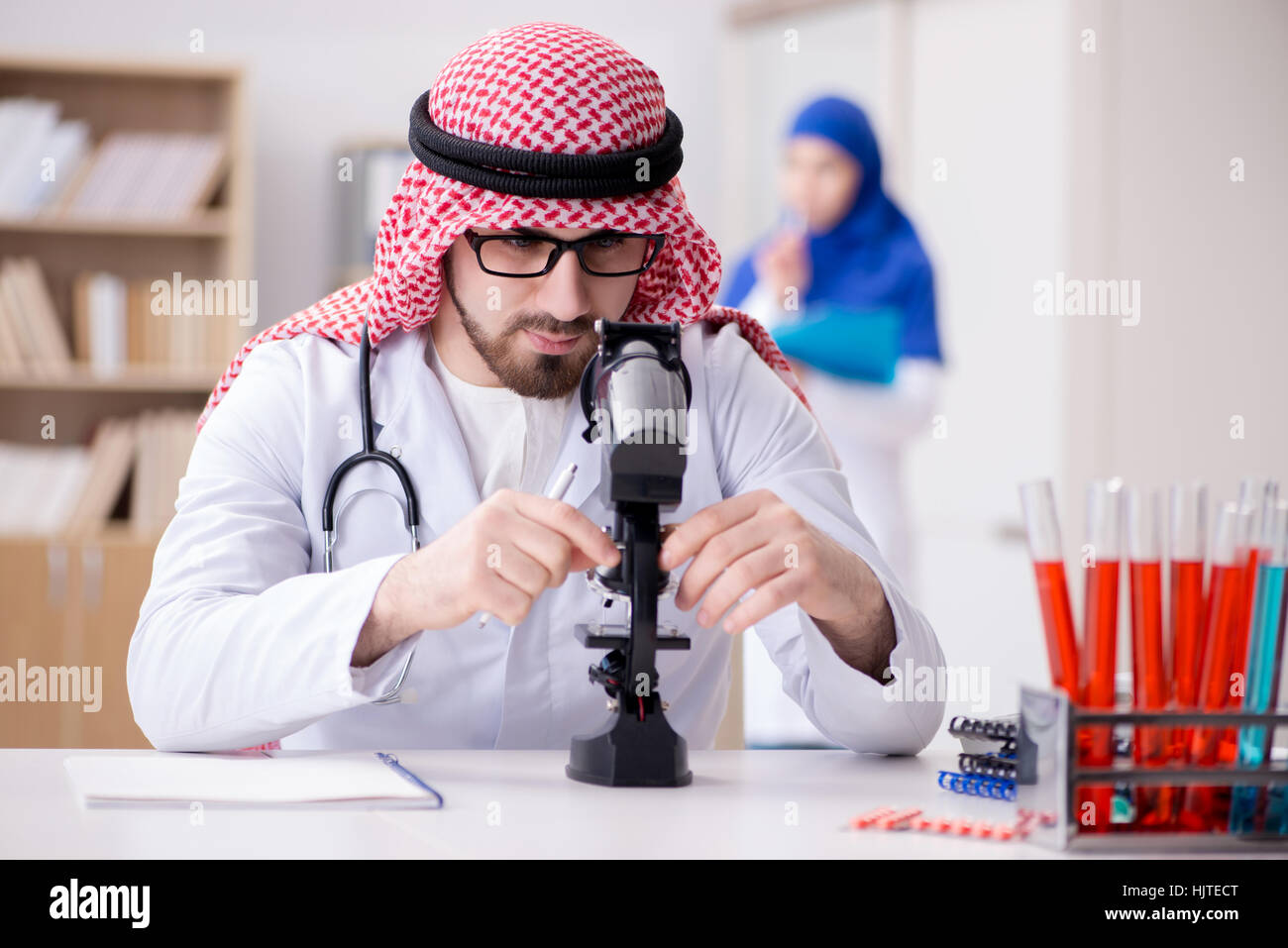 Arab doctor working in the lab hospital Stock Photo - Alamy