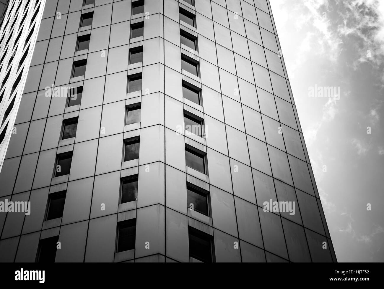 Windows of commercial building in Hong Kong with B&W color Stock Photo ...