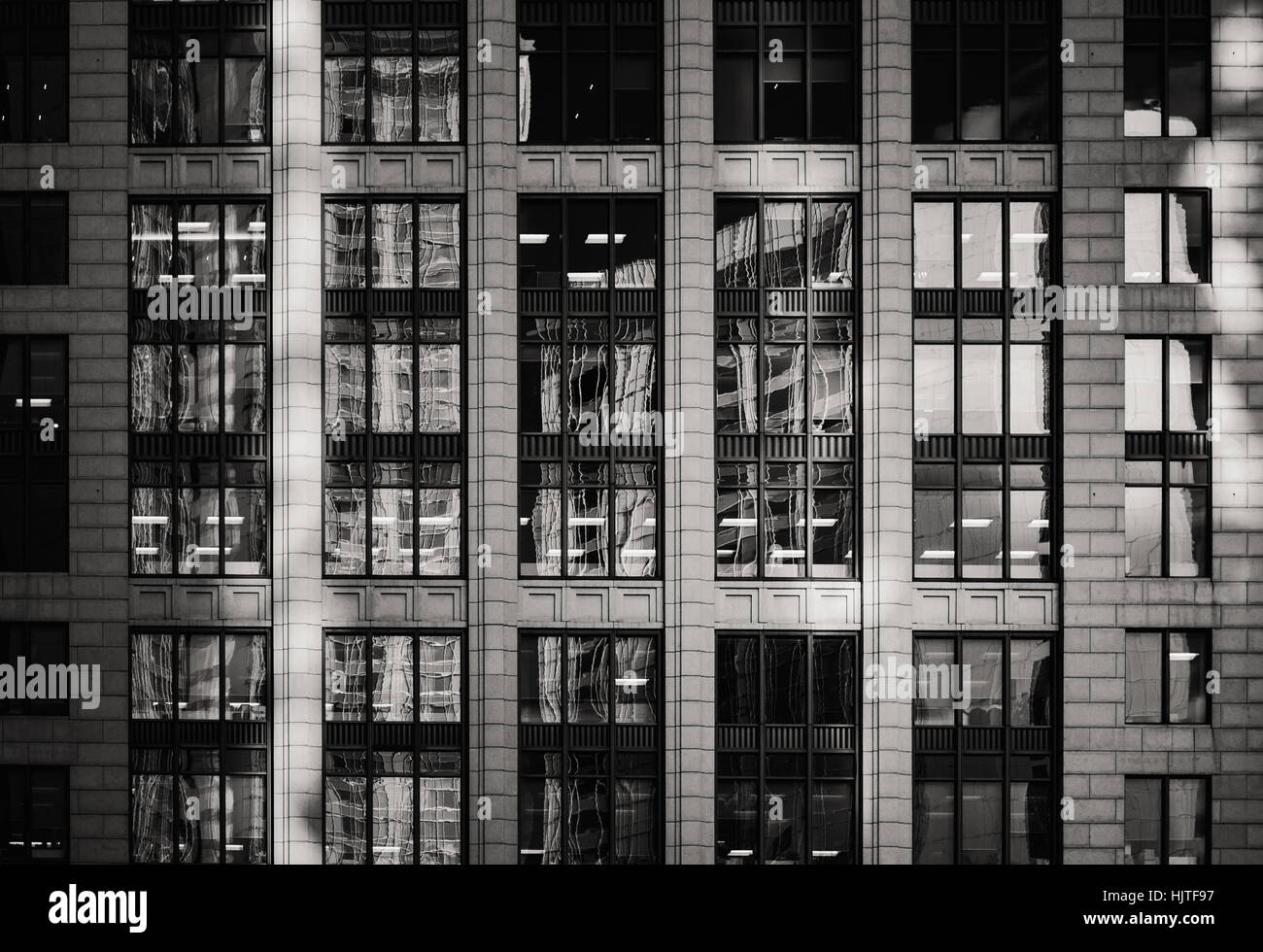 Windows of commercial building in Hong Kong with B&W color Stock Photo ...