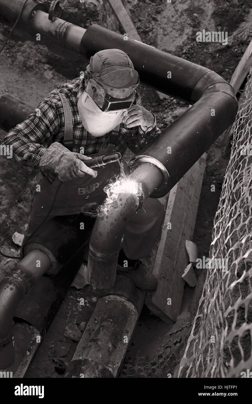 welding of pipes for heating system Stock Photo - Alamy