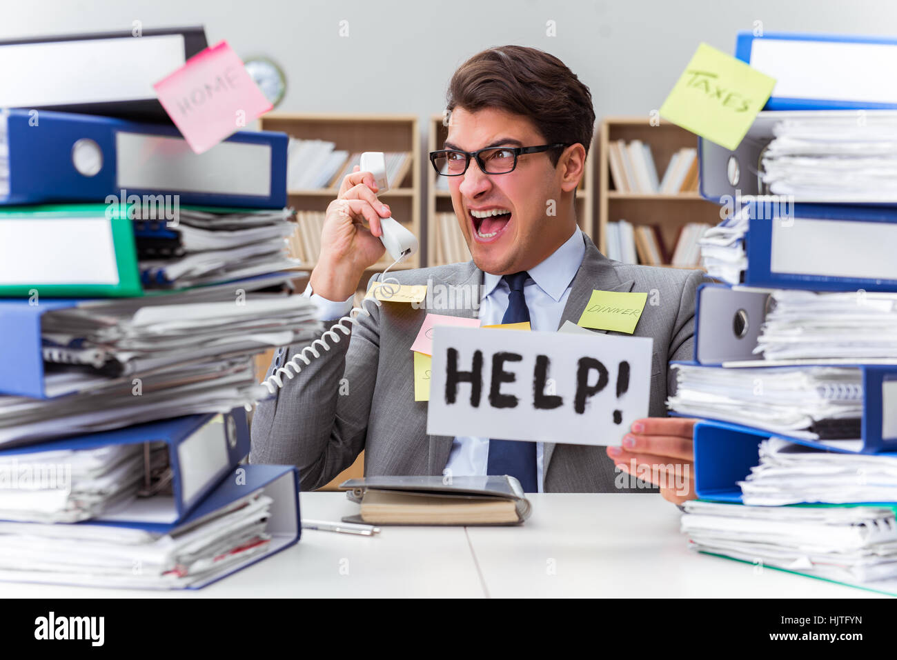 Busy businessman asking for help with work Stock Photo - Alamy