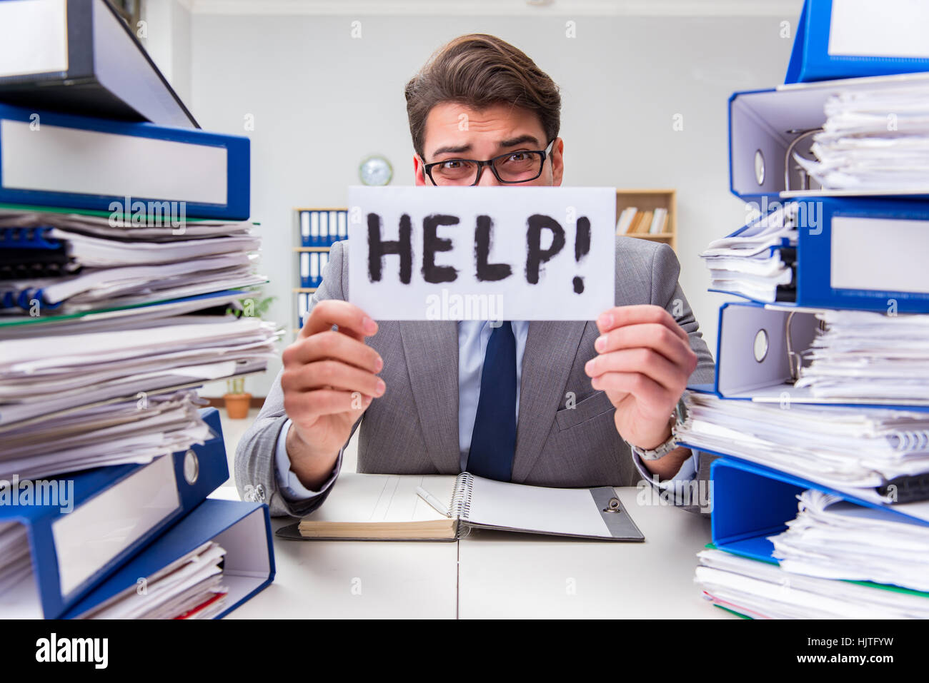 Busy businessman asking for help with work Stock Photo - Alamy