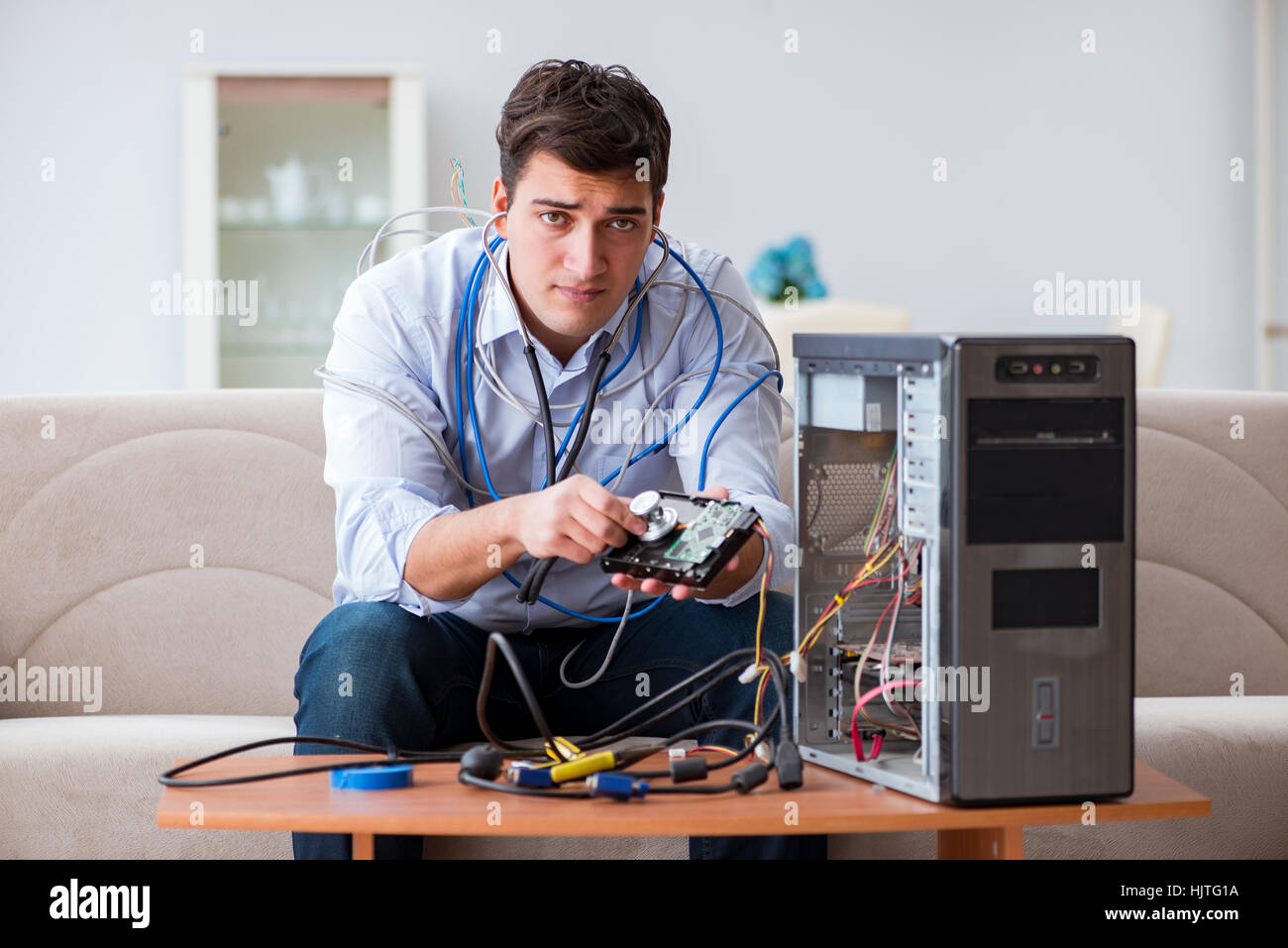 Frustrated man with broken pc computer Stock Photo - Alamy