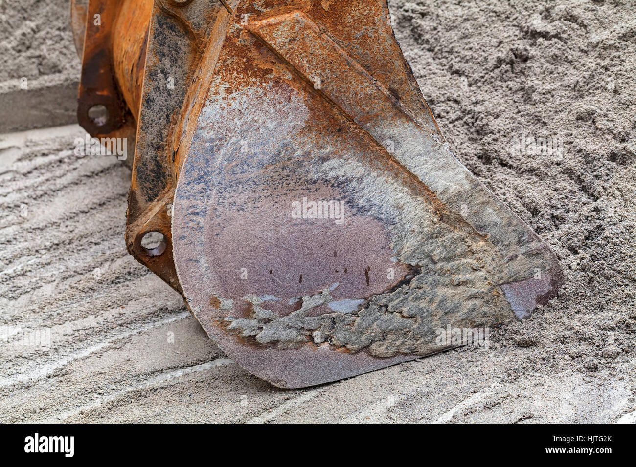 loading sand with bucket on the excavator, note shallow depth of field ...