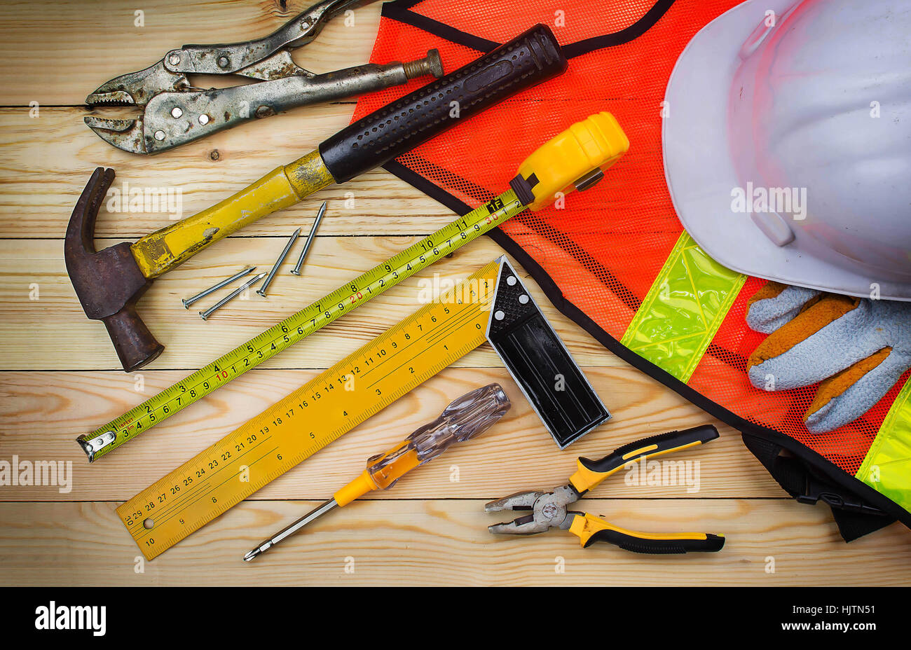 Construction tools on worker desk Stock Photo - Alamy
