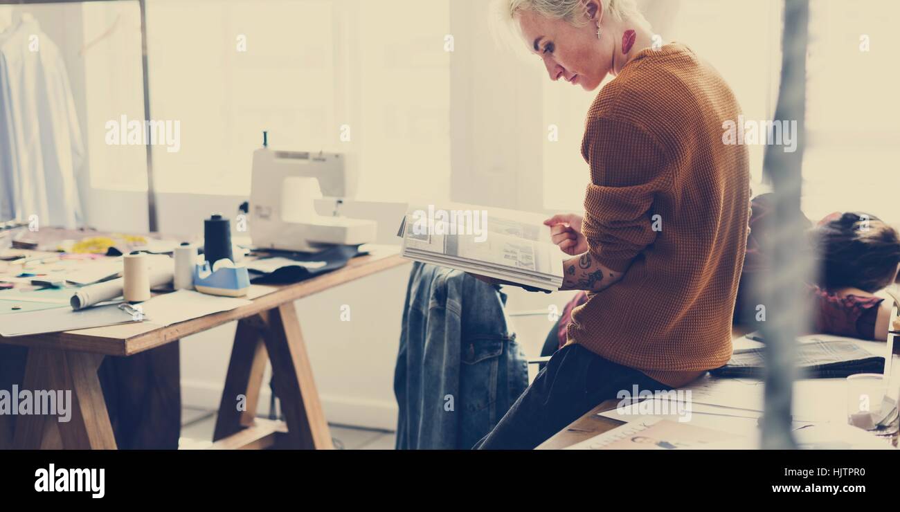 Fashion Designer Magazine Reading Concept Stock Photo - Alamy