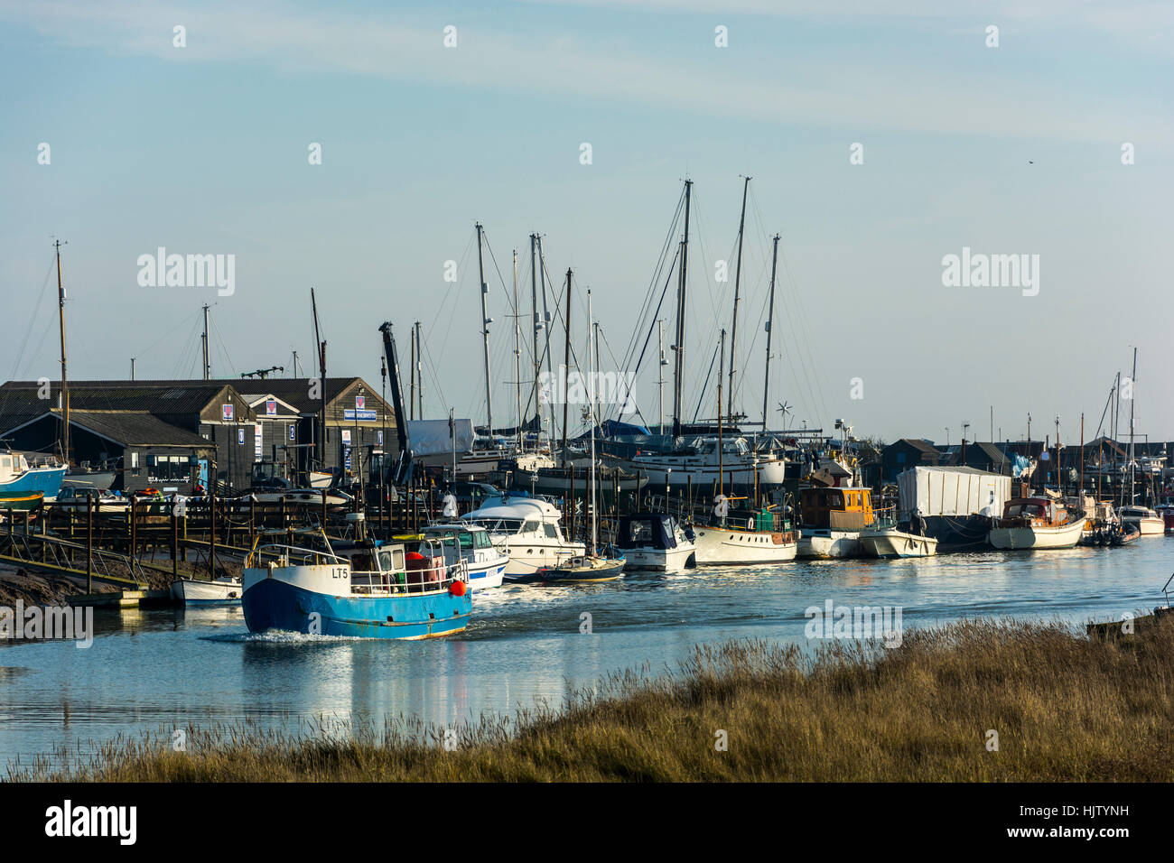 Southwold Harbour River Blyth fishing boat returns Stock Photo - Alamy