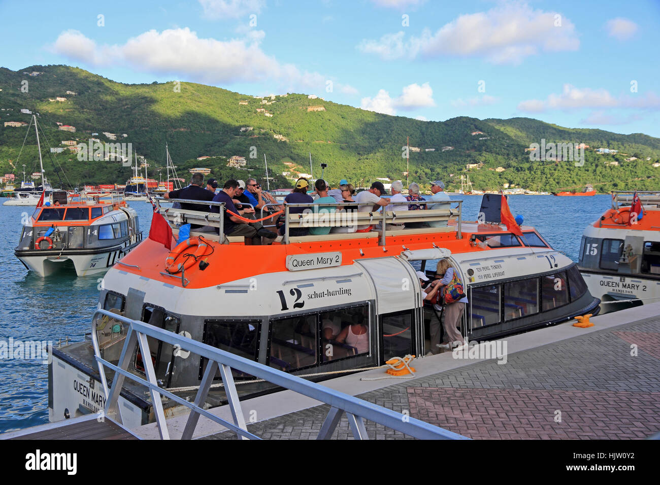 Tenders for Cunard liner Queen Victoria ferrying passengers from shore ...
