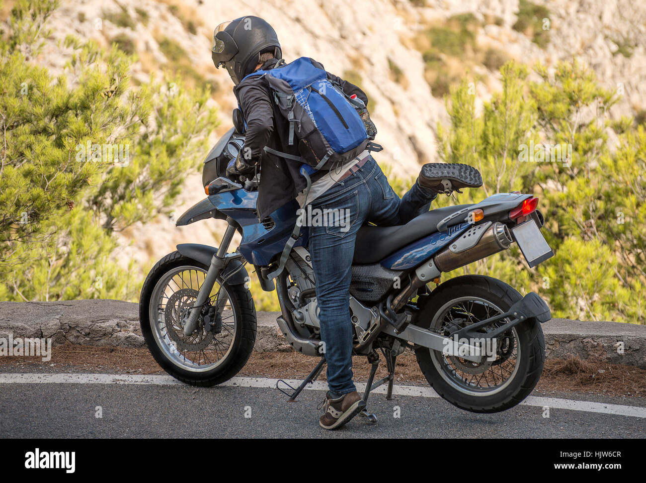 Tourist using motorcycle in mountains Stock Photo - Alamy