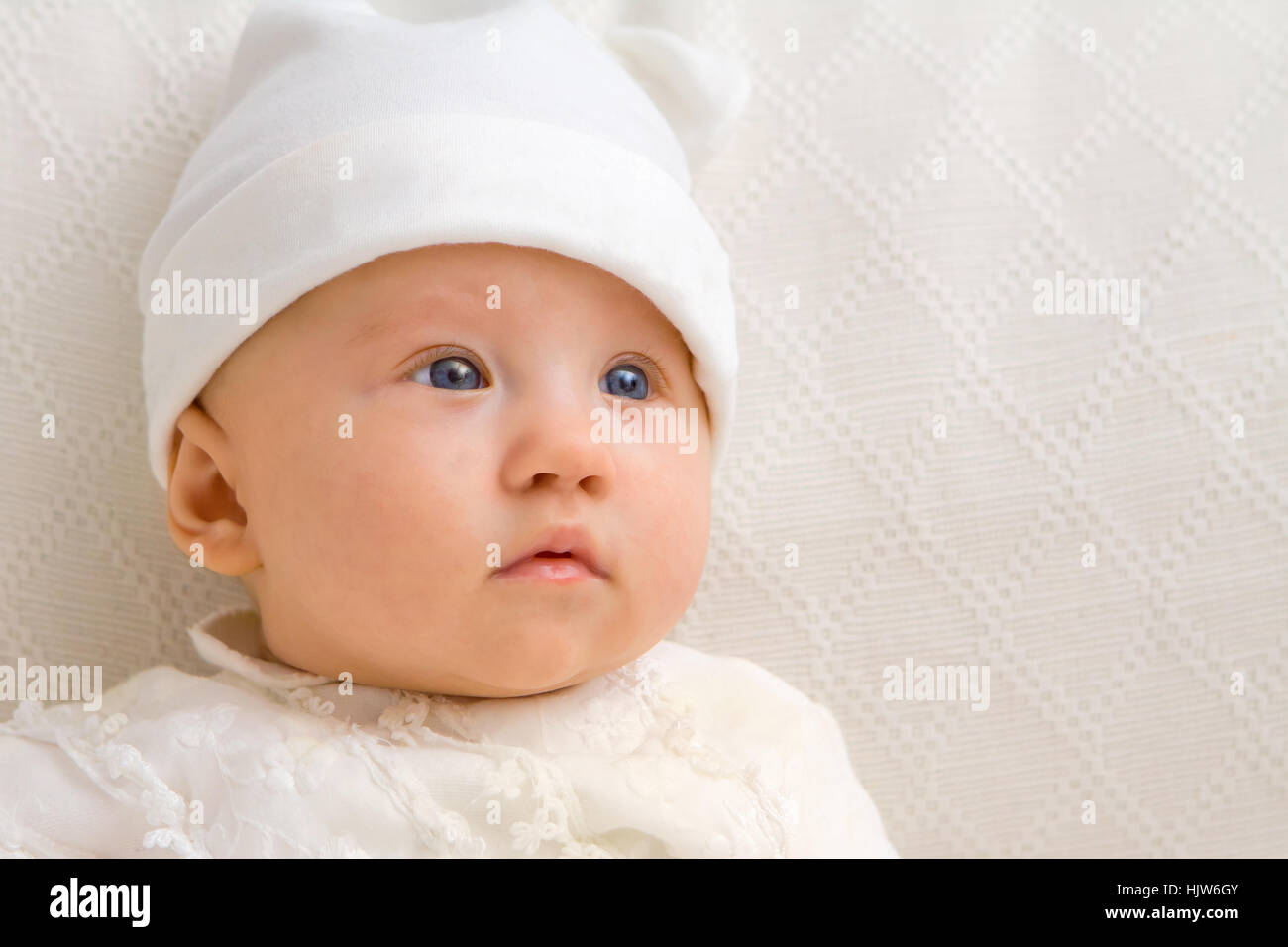 Sweet baby close up with hat Stock Photo - Alamy