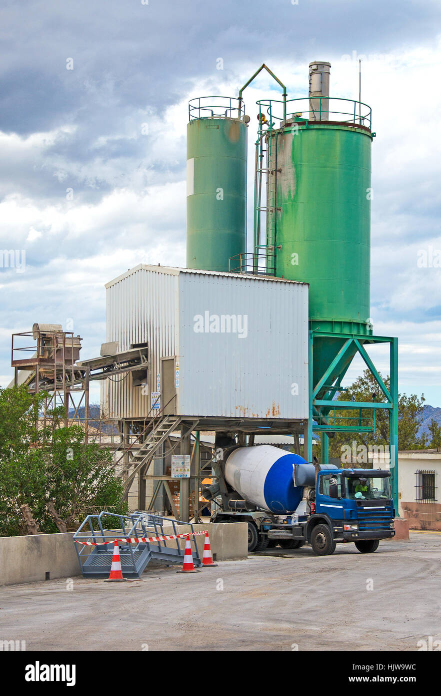 The heavy truck is loading on cement factory Stock Photo - Alamy