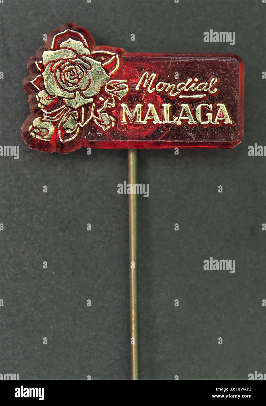 The Mondial Malaga advertising pin, a collectible item likely tied to ...