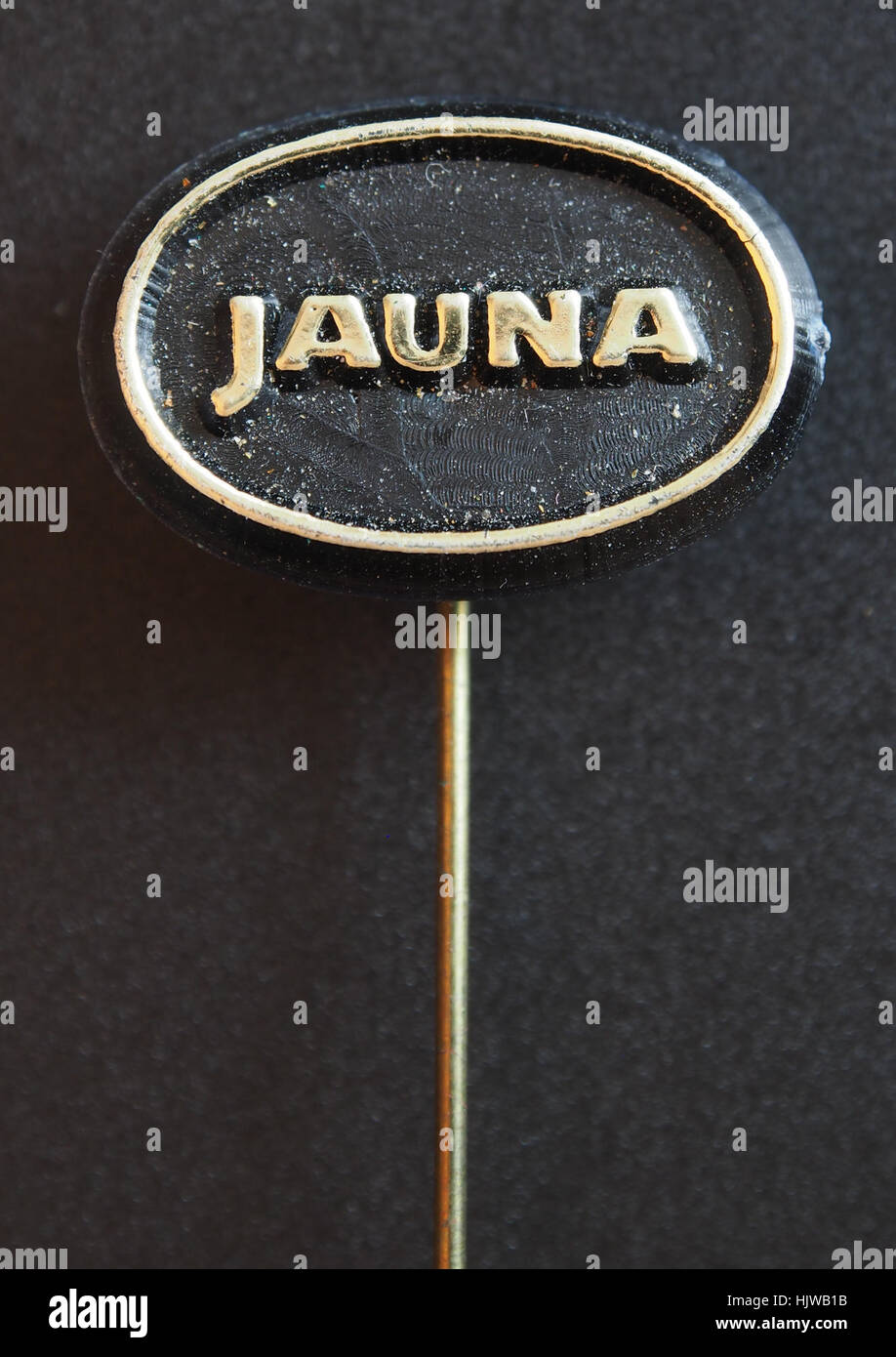 The Jauna advertising pin is a vintage promotional item likely used to ...