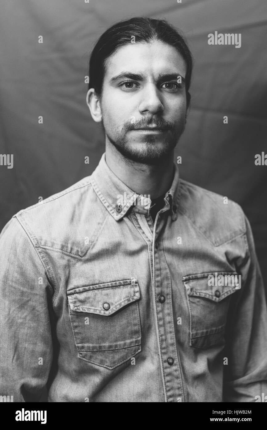 Man in black denim Black and White Stock Photos & Images - Alamy