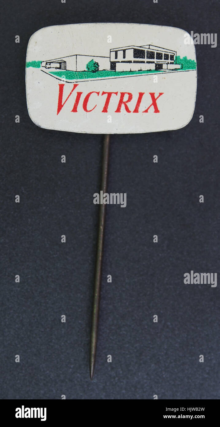 The Victrix advertising pin, a vintage promotional item from the ...