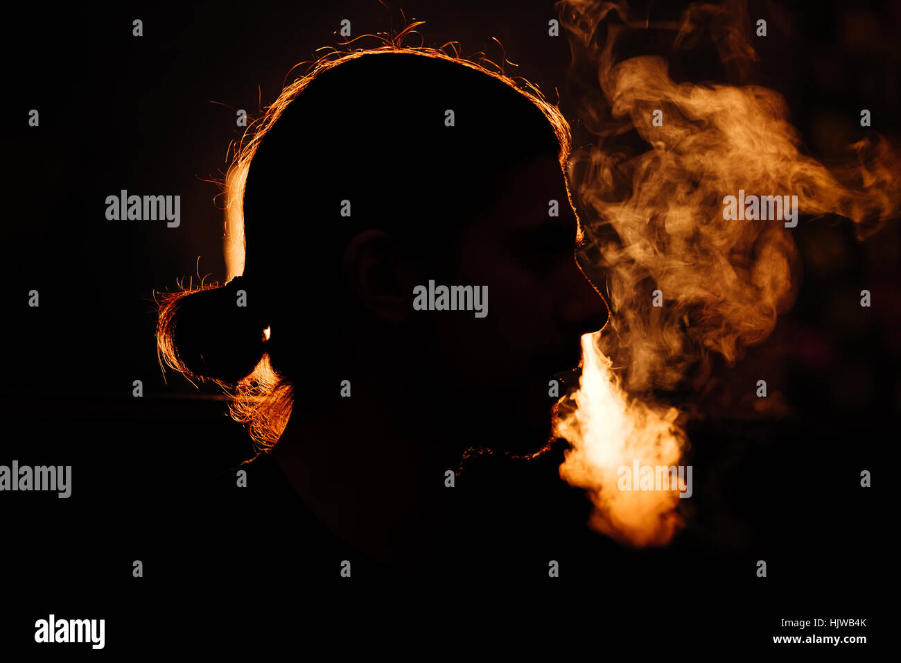 man's head in the smoke Stock Photo - Alamy