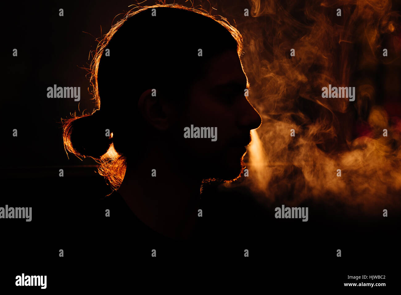 man's head in the smoke Stock Photo - Alamy