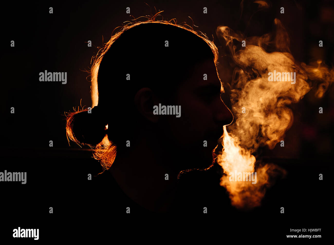 man's head in the smoke Stock Photo - Alamy
