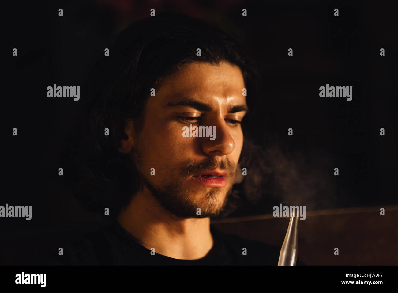 man in the hookah closeup Stock Photo - Alamy