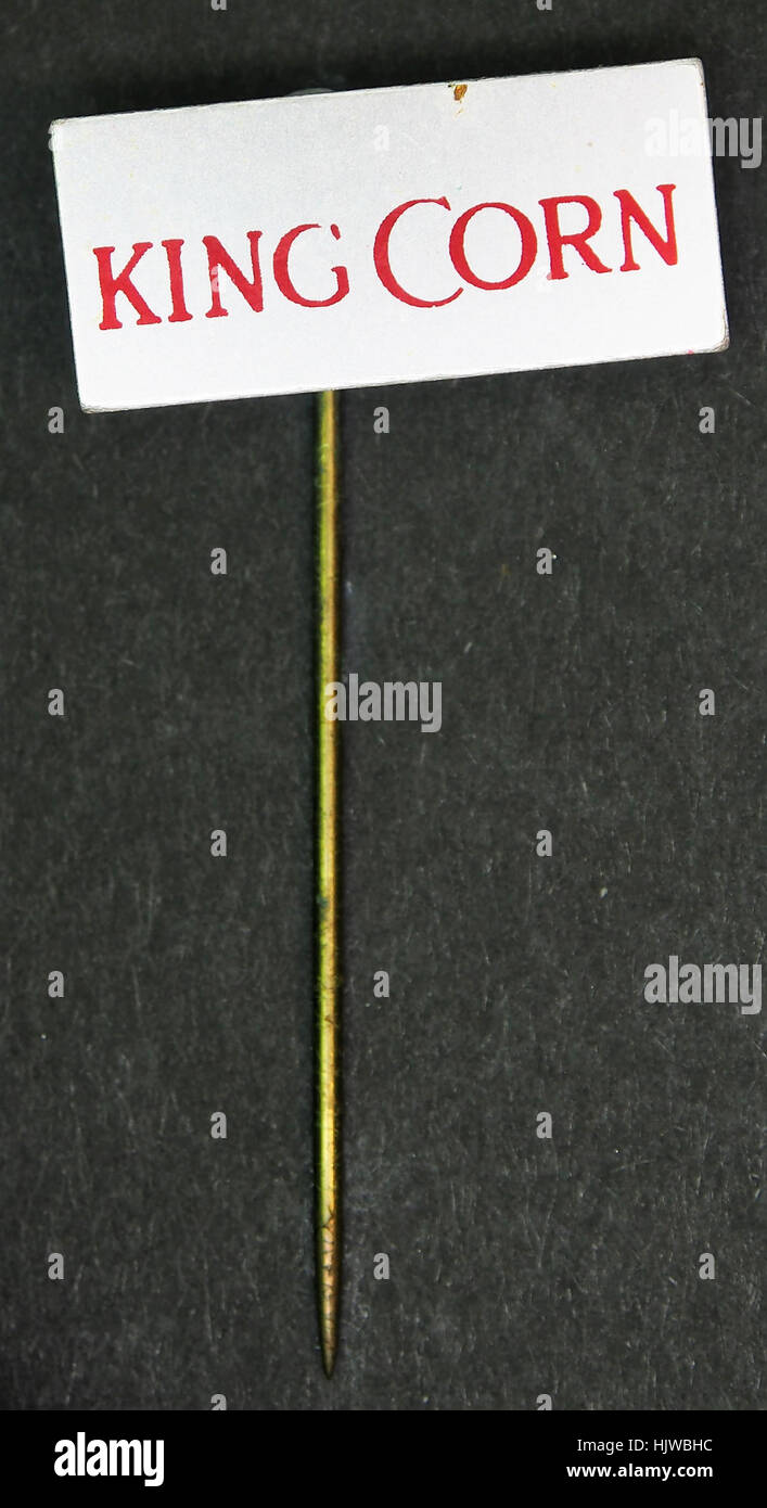 A collectible King Corn advertising pin, promoting the American ...