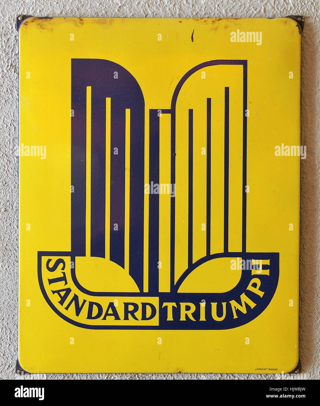 A vintage enamel advertising sign for Standard Triumph, promoting their ...