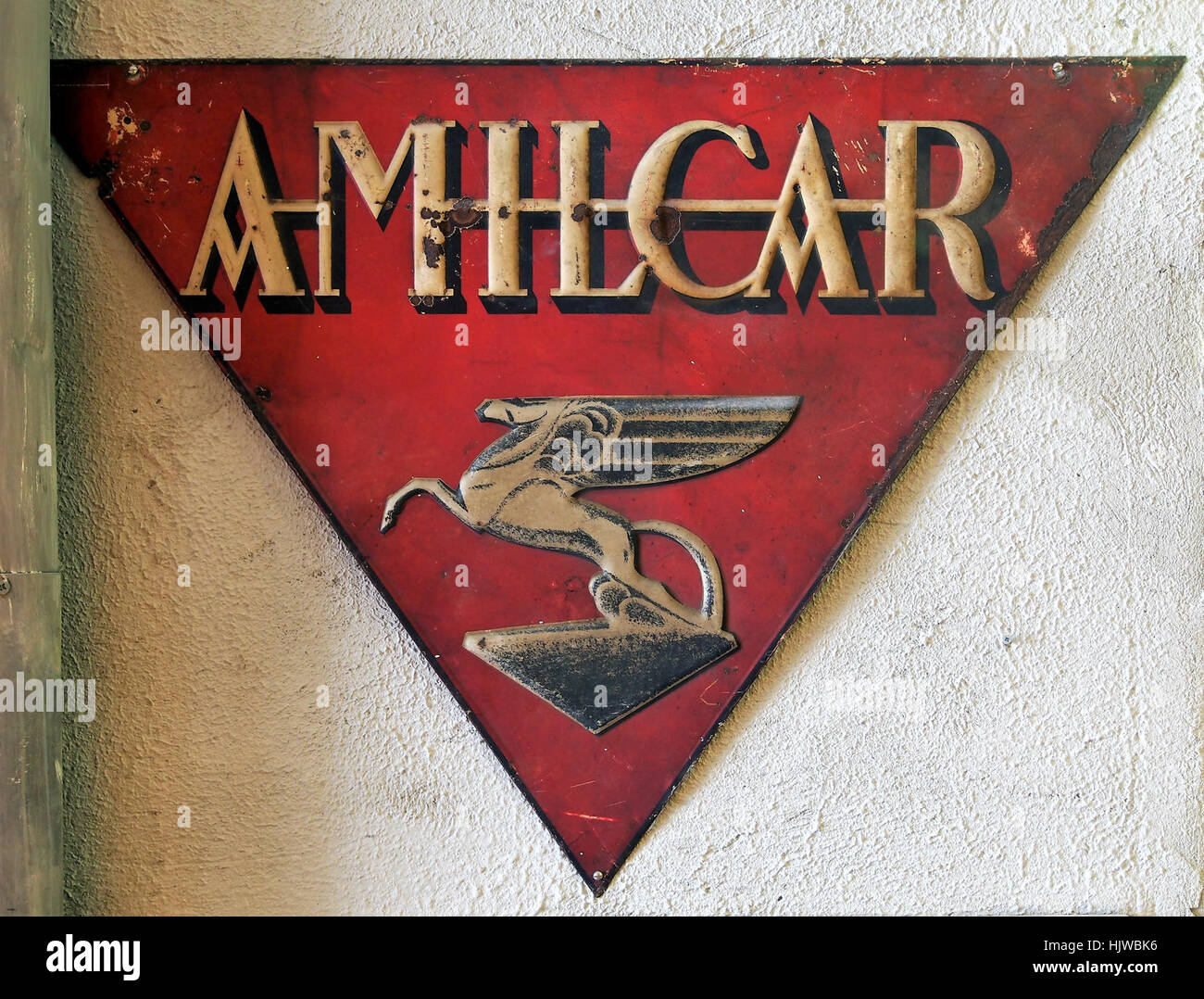 The Amilcar enamel advertising sign, displayed at the Louwman Museum ...
