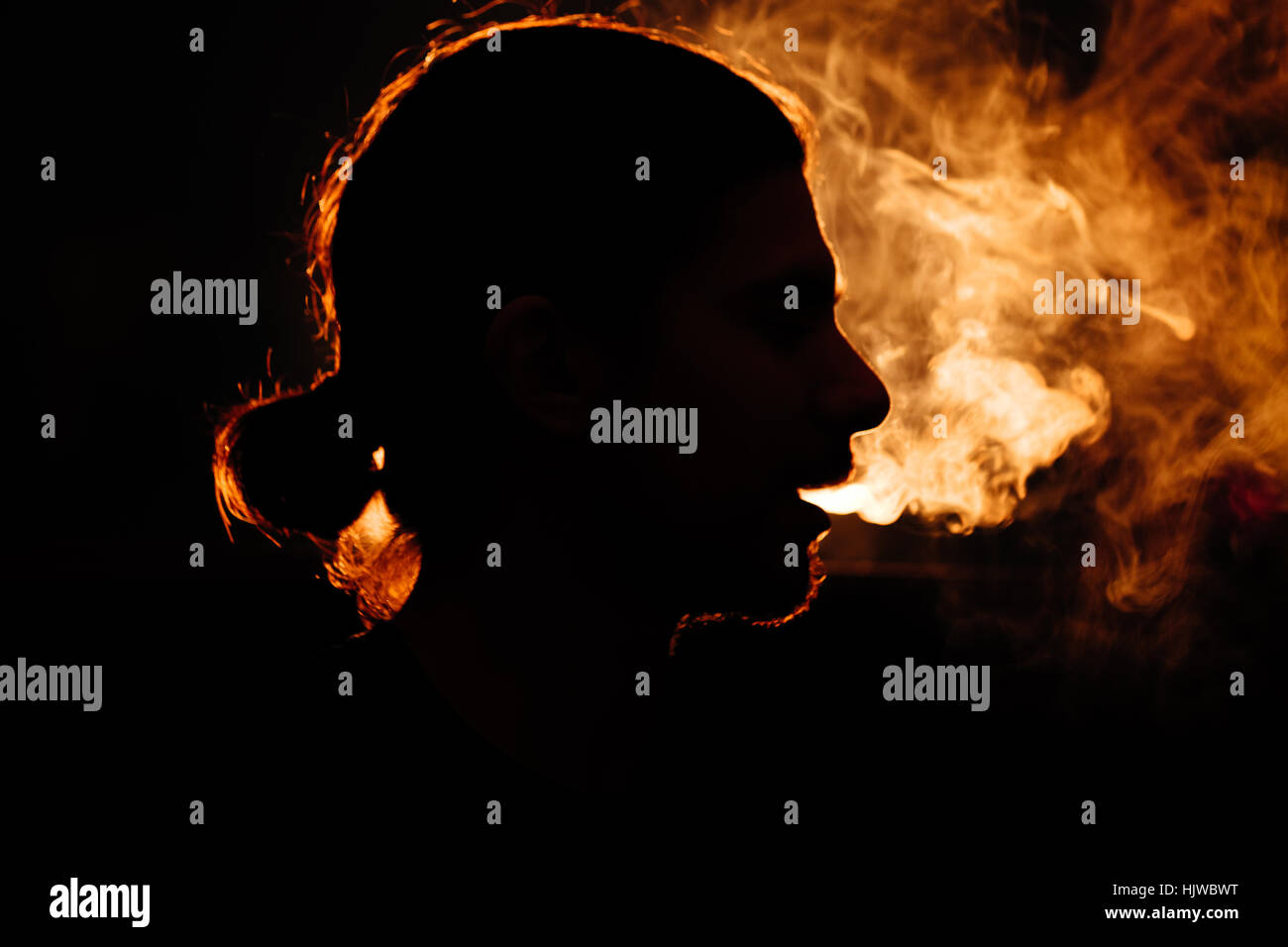 man's head in the smoke Stock Photo - Alamy