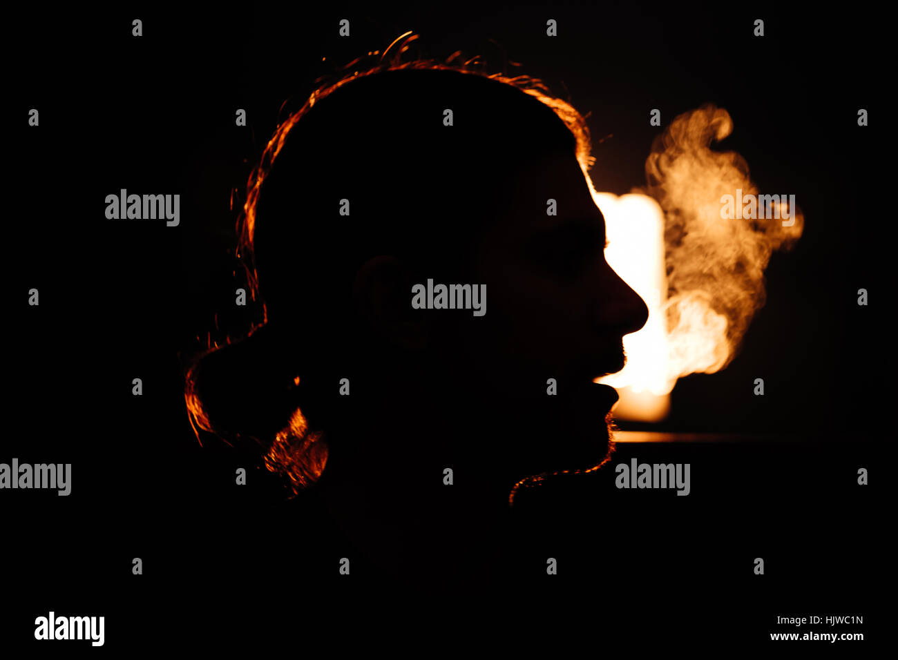 man's head in the smoke Stock Photo - Alamy