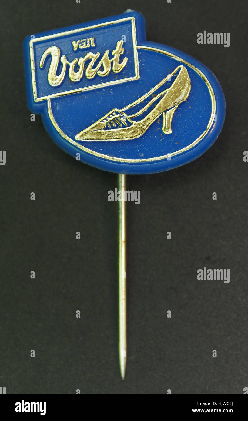 Vintage advertising pin from the Van Vorst company, featuring its logo ...