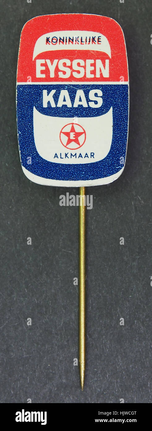 An Eyssen kaas (cheese) Alkmaar advertising pin, likely used to promote ...
