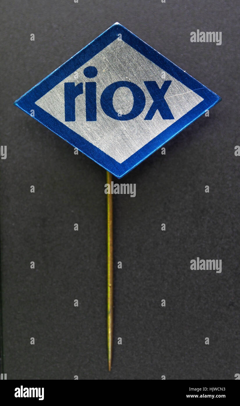 Riox advertising pin, featuring the brand's logo, a vintage promotional ...