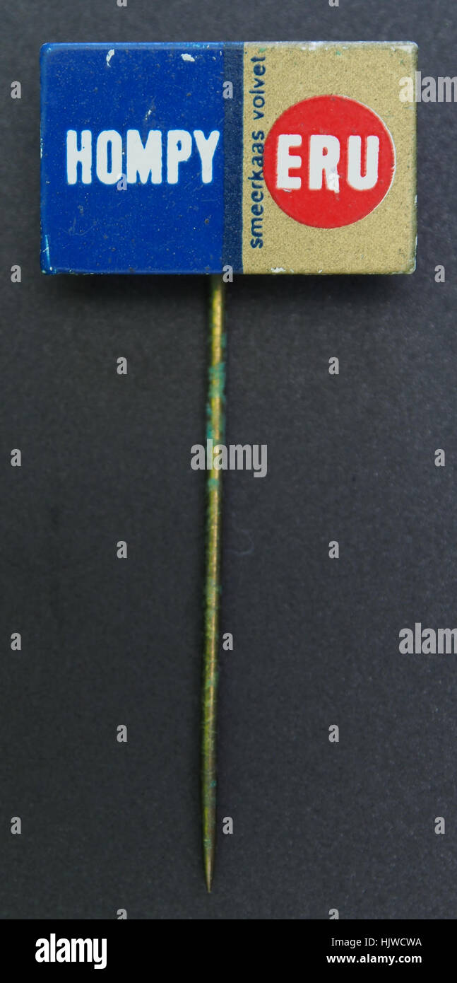 This ERU Hompy advertising pin was a promotional item for ERU cheese, a ...