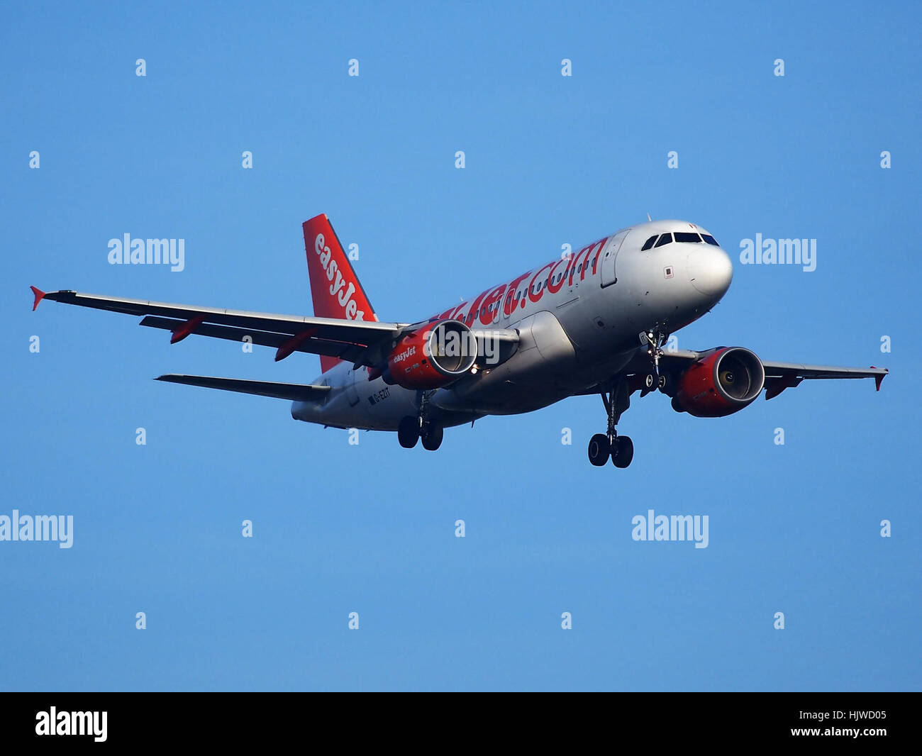 The Airbus A319-111 (G-EZIT) operated by EasyJet, landing at Schiphol ...