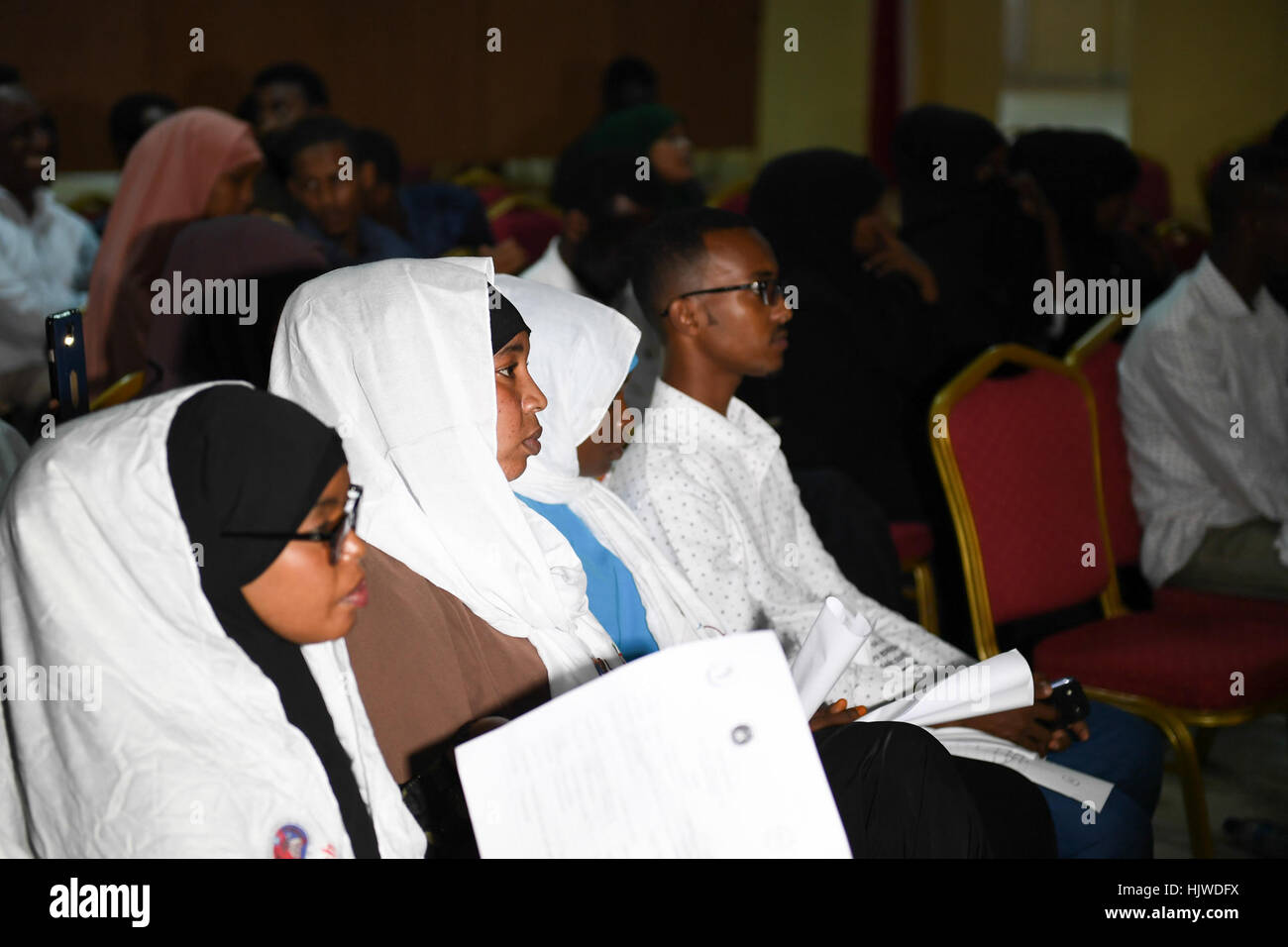 Participants engage in a Safe Cities Campaign symposium in Mogadishu ...