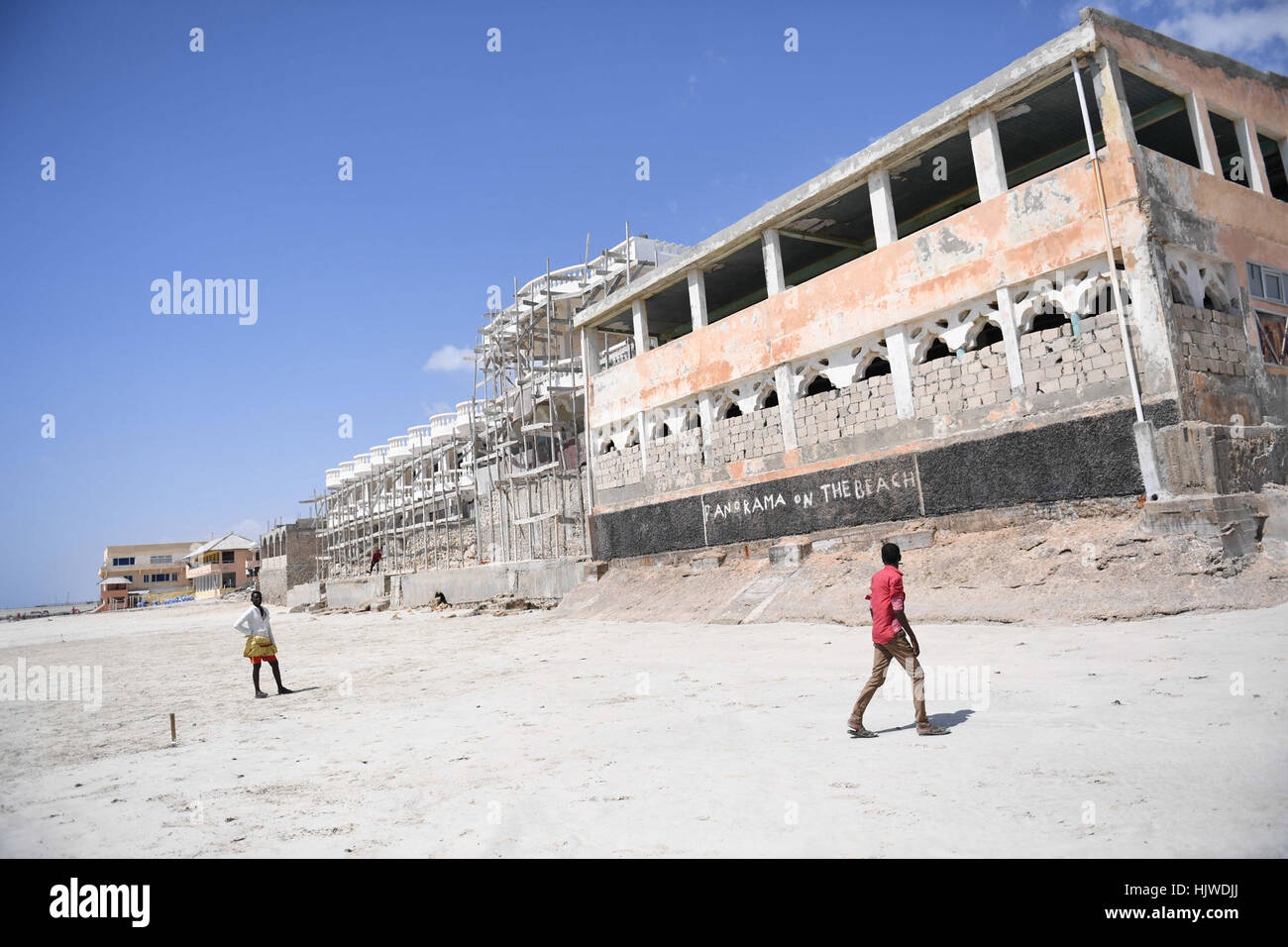 Boys walk along Lido beach in Mogadishu, Somalia, on December 31, 2016 ...